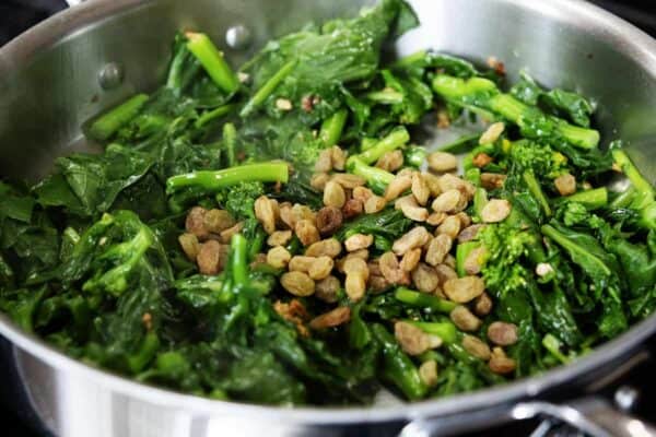Rapini (Broccoli Rabe) with Raisins and Hazelnuts - Pinch and Swirl