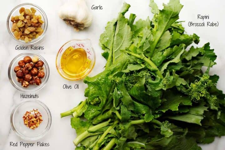 Rapini (Broccoli Rabe) with Raisins and Hazelnuts - Pinch and Swirl