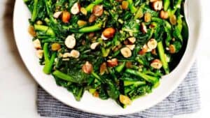 Rapini (Broccoli Rabe) with Raisins and Hazelnuts - Pinch and Swirl