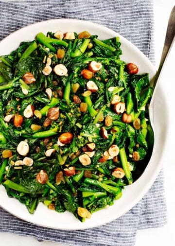 Rapini (Broccoli Rabe) with Raisins and Hazelnuts - Pinch and Swirl
