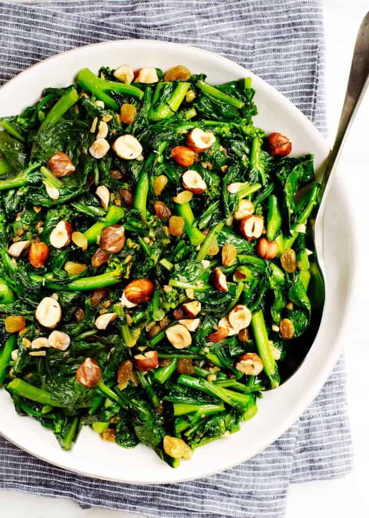 Rapini (Broccoli Rabe) with Raisins and Hazelnuts - Pinch and Swirl
