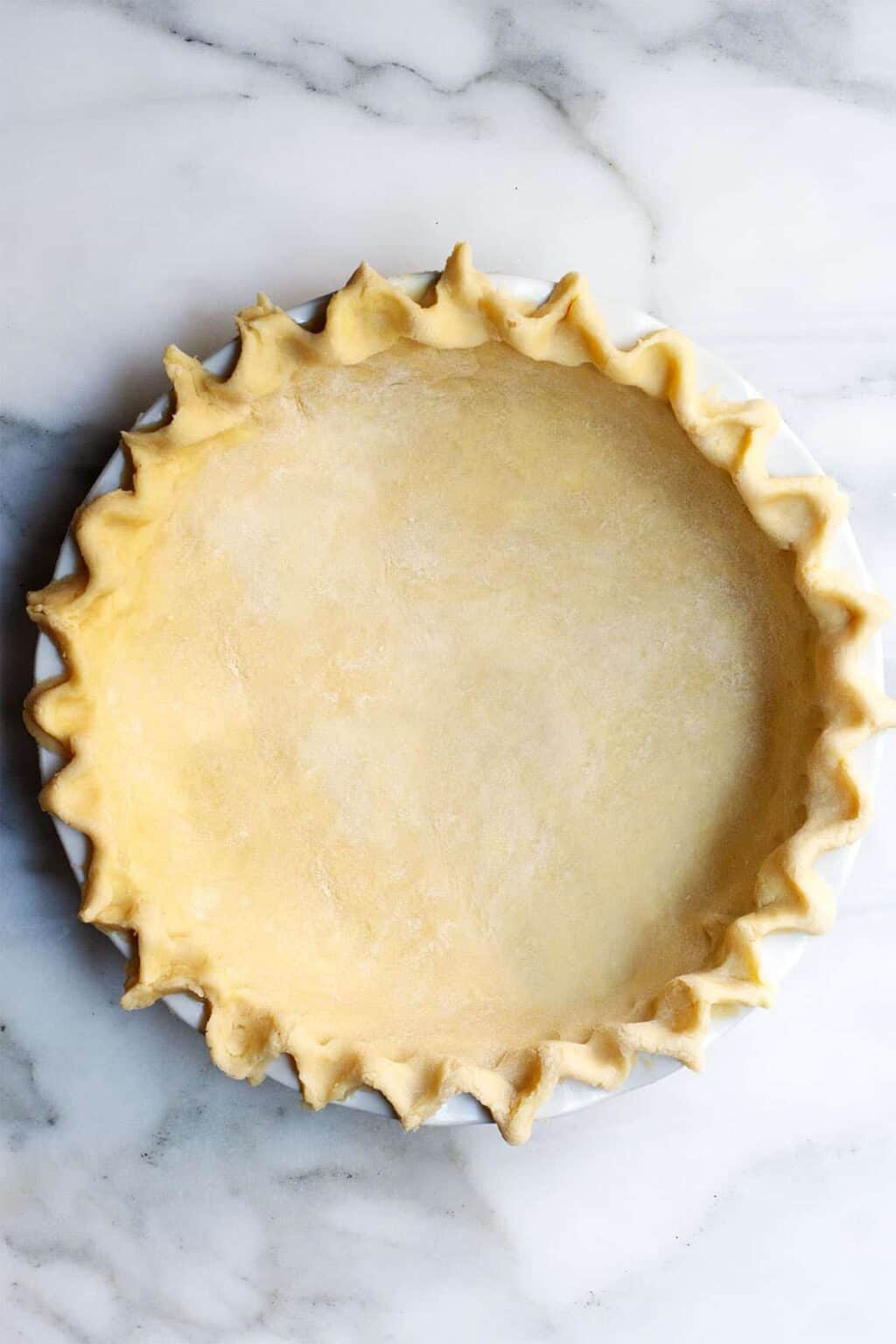 Lard Pie Crust (Ultra flaky and flavorful!) - Pinch and Swirl