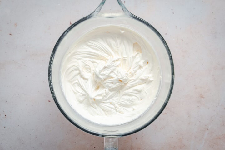 Stabilized Whipped Cream Frosting (5 minute recipe!) - Pinch and Swirl