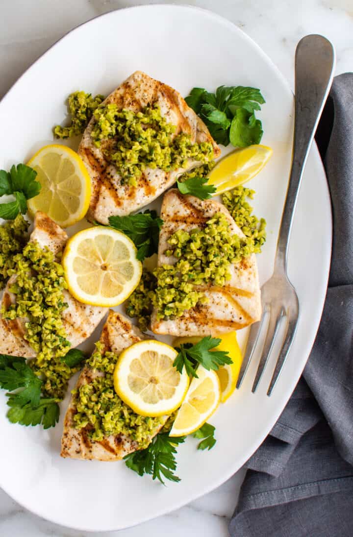 Grilled Swordfish with Green Olive Tapenade - Pinch and Swirl
