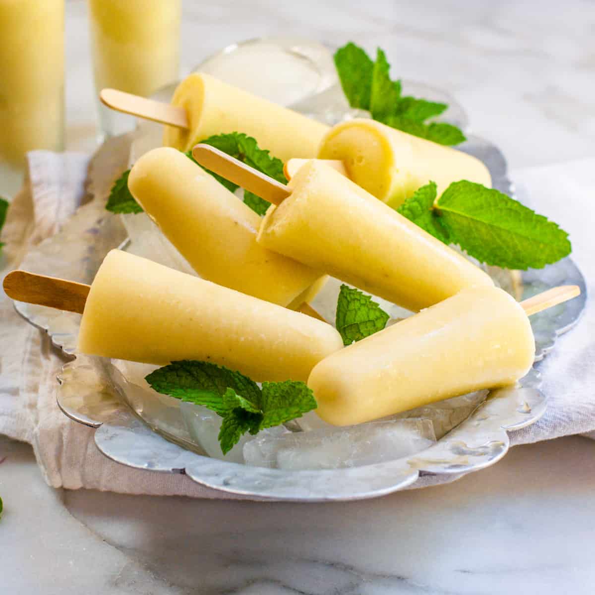Piña Colada Mini Popsicles - Pinch and Swirl